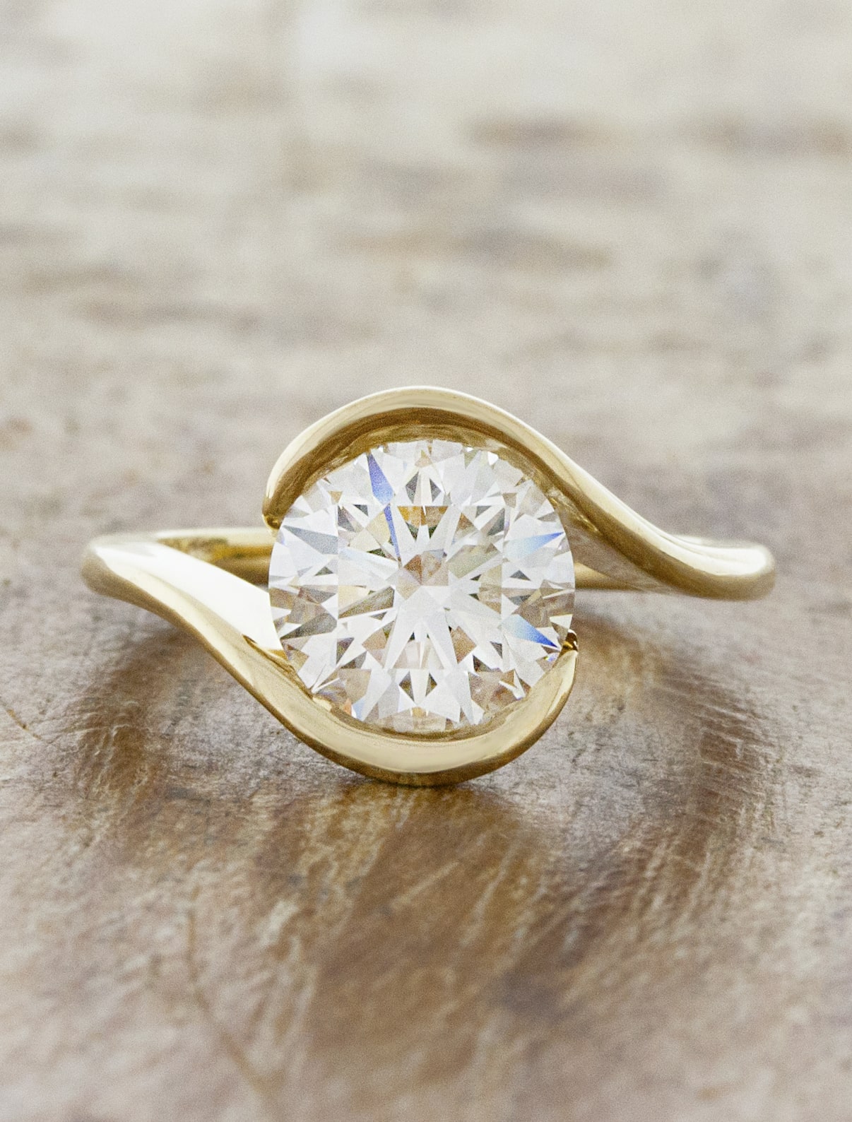 Salomé: Sleek Curved Bypass Bezel Engagement Ring with Round Diamond ...