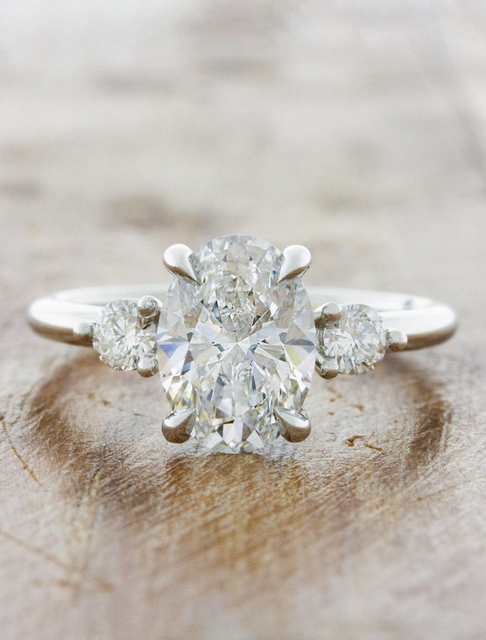 Menci: Three-Stone Natural Oval Diamond Engagement Ring | Ken & Dana Design