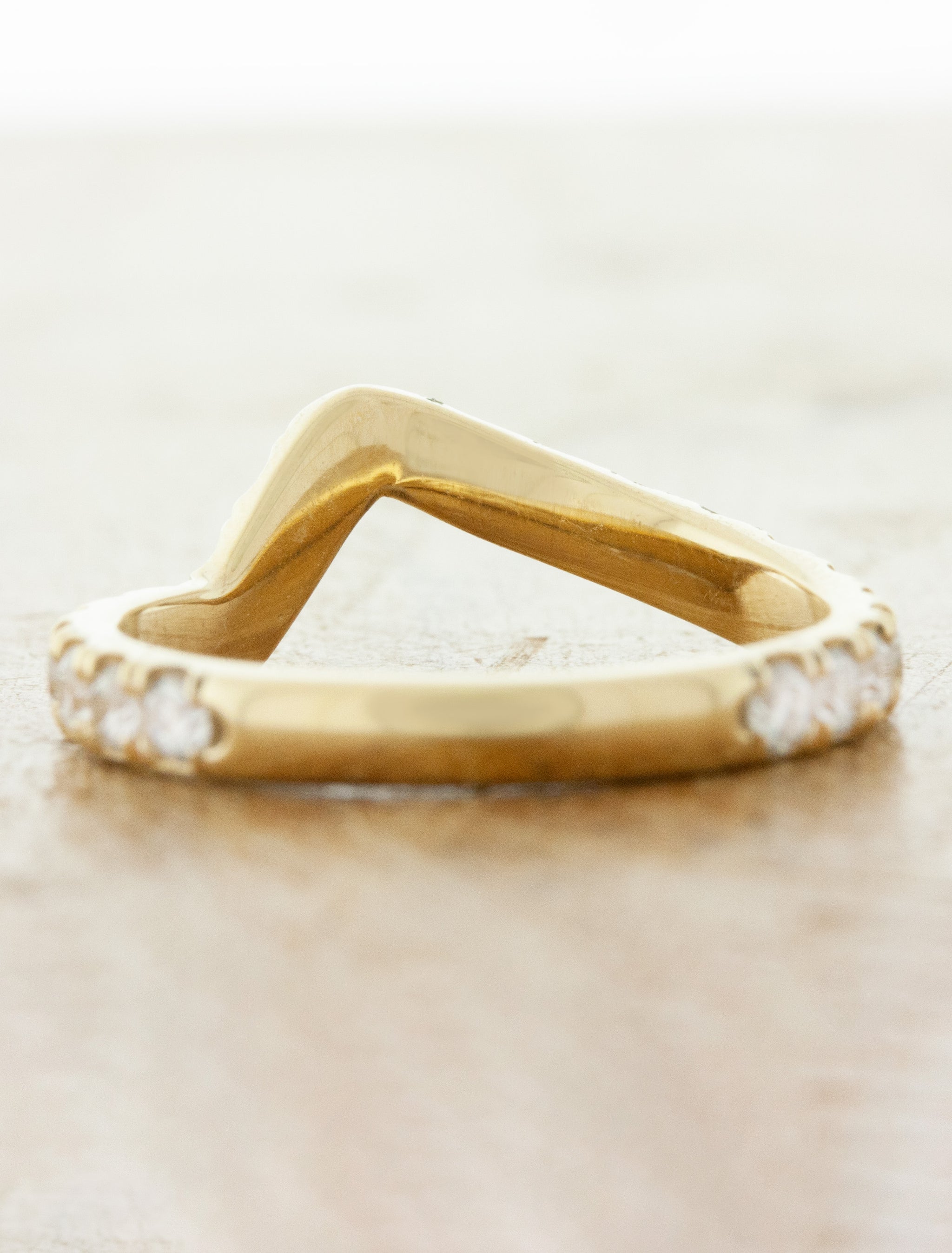 Silas: Curved Wedding Band with Diamonds and Blue Sapphire | Ken & Dana Design