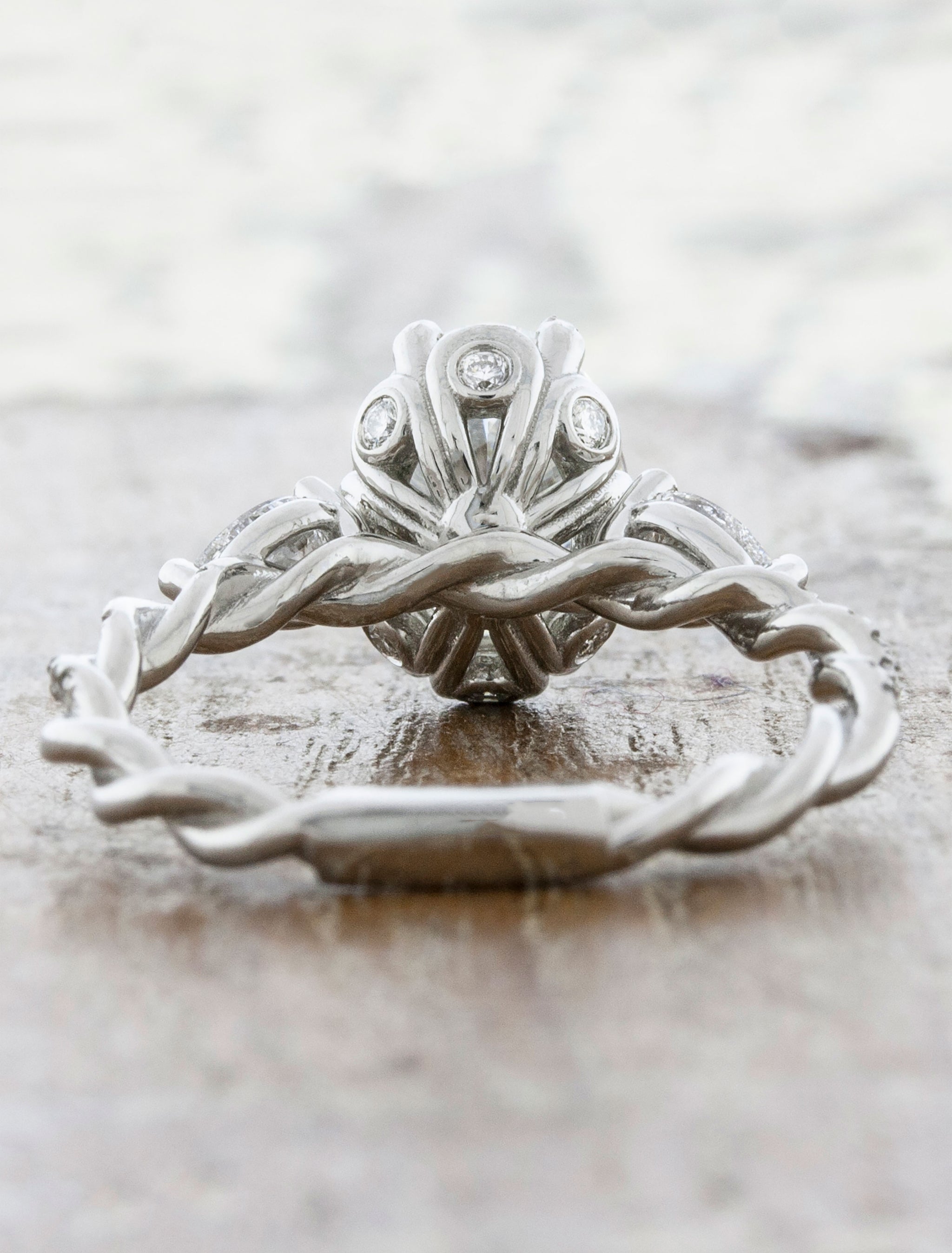 Marcellina: Platinum Oval Diamond, Twisted Band Ring | Ken & Dana Design