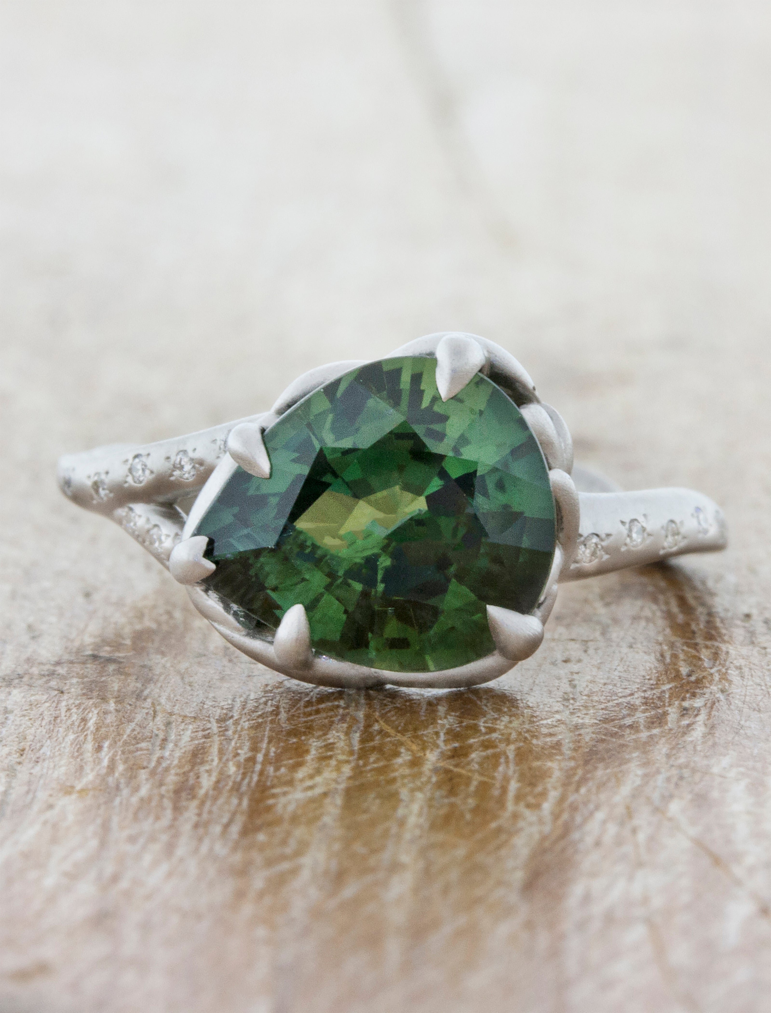 Tanya: Horizontal Pear-Shaped Diamond in Wavy, Diamond Band | Ken & Dana